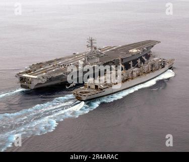 The USS Nimitz (CVN 68) conducts a replenishment at sea with the USNS ...