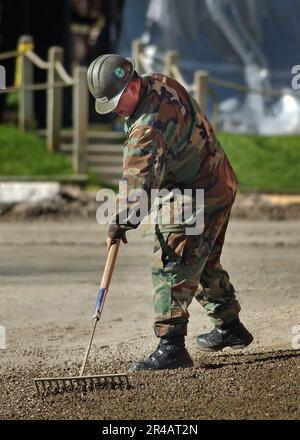 US Navy Equipment Operator 3rd Class of Naval Mobile Construction ...