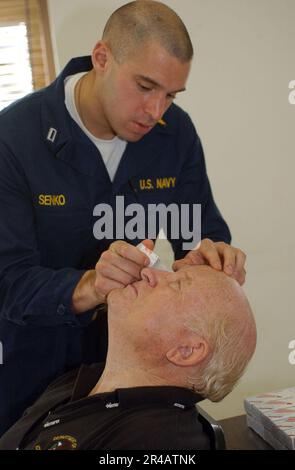 US Navy Lt. an optometrist assigned to the Military Sealift Command ...