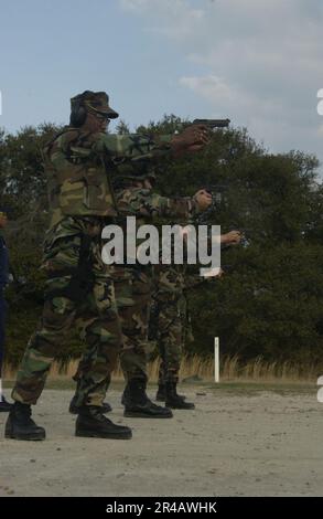 US Navy Photographer's Mate 1st Class assigned to the Naval Reserve ...