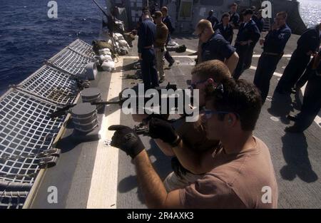 US Navy Store Keeper 1st Class assigned to Explosive Ordnance Disposal ...