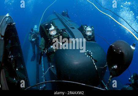 US Navy Members of SEAL Delivery Vehicle Team Two (SDVT-2) prepare to ...