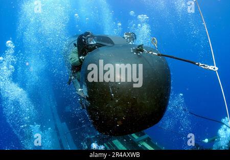 US Navy A member of SEAL Delivery Vehicle Team Two (SDVT-2) climbs ...