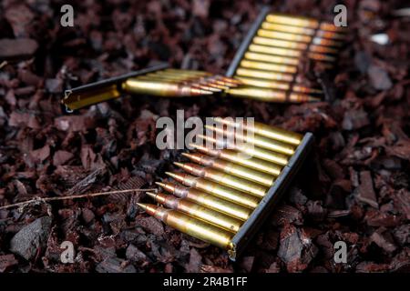 Three soldiers in a rifle pit Stock Photo - Alamy