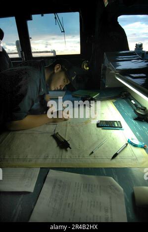 U.S. Navy Quartermaster 3rd Class Demario Welch, serving as the Master ...