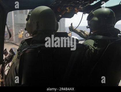Pilot gives thumbs up signal Stock Photo - Alamy