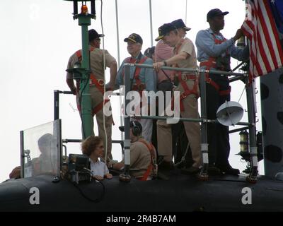 US Navy Former President Jimmy Carter looks over the navigation table ...