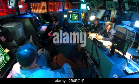 US Navy Air Traffic Controllers man the Carrier Air Traffic Control ...