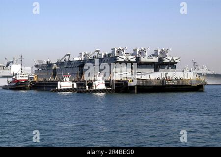 Improved Navy Lighterage System (INLS) Warping Tug 11 hip tows the INLS ...
