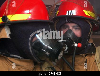 fire fighting, gq, Sailors, U.S. Navy Stock Photo - Alamy
