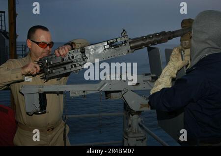 US Navy Chief Aviation Ordnanceman leads the G-3 weapons division in a ...