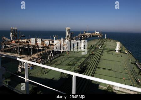 An oil tanker is docked at the Al Basrah Oil Terminal in the Persian ...