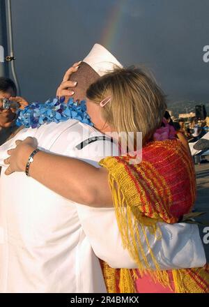 US Navy Torpedoman's Mate 3rd Class instructs Gunner's Mate 3rd Class ...