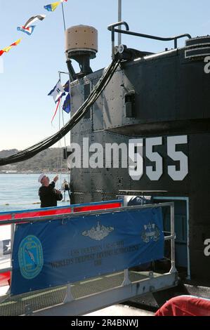 US Navy A Sailor hoists the Stock Photo - Alamy