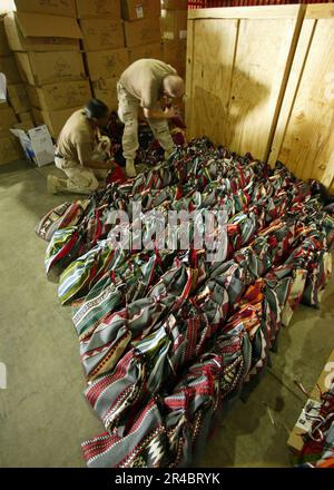 US Navy Members of Navy Customs Battalion ROMEO perform formation ...