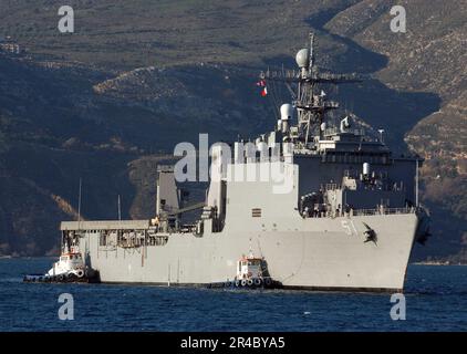 US Navy Tug boats assist the Nimitz Class aircraft carrier USS George ...