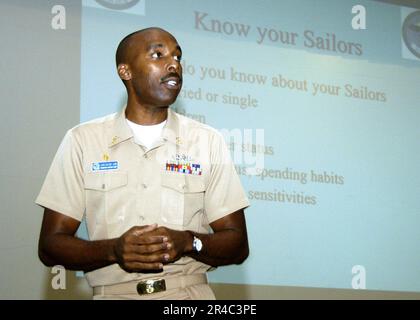 US Navy Master Chief Operational Specialist says good bye to his ...