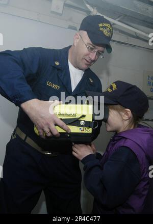 US Navy Chief Damage Controlman assigned to the Ticonderoga-class ...