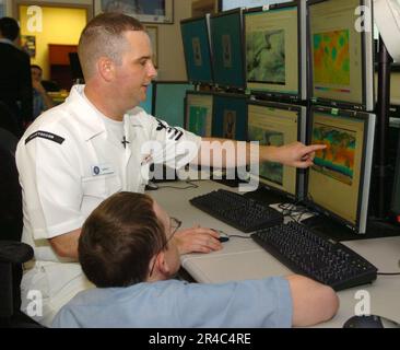 US Navy Aerographer's Mate 2nd Class uses an example of a storm ...