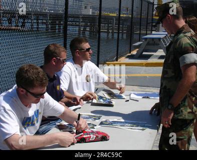 US Navy Dale Earnhardt Jr., signs a few autographs for recruits on ...