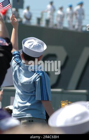 US Navy Family members welcome home their sailors stationed aboard the ...