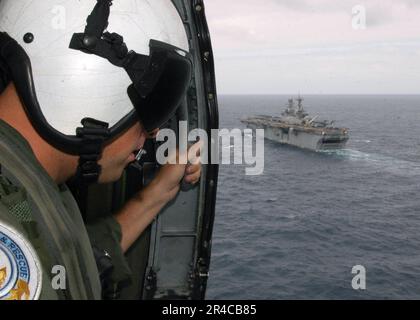 US Navy Aviation Warfare Technician 3rd Class left, and Hospital ...