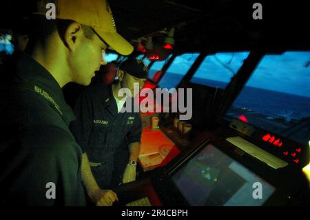 Lt. instructs Ensign on watch standing duties as officer of the deck ...