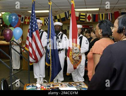 Naval Station Mayport's color guard parade the colors during a wreath ...
