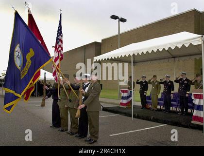 US Navy The official party salutes as the color guard parades the ...