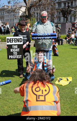 Activists participate in an Extinction Rebellion protest in the ...