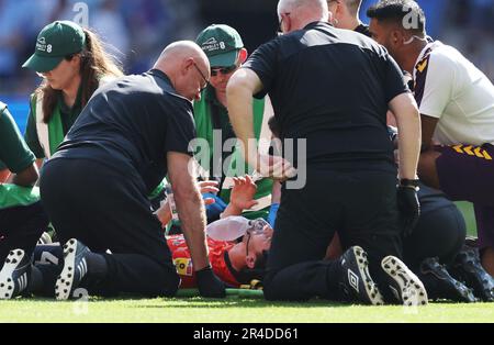 Tom Lockyer of Luton Town is stretchered off the pitch after receiving ...