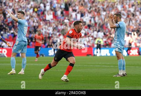 Luton Town's Jordan Clark celebrates with team-mates after scoring ...