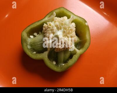 closeup view of half cut capsicum for multipurpose use of projects ...