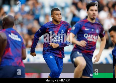 PSG's Kylian Mbappe, centre, warms up prior to the French League One ...