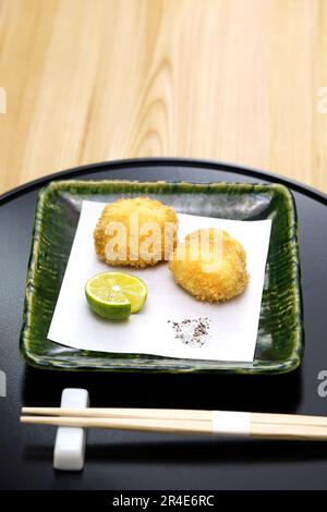 fried puffer fish milt, traditional Japanese cuisine Stock Photo - Alamy