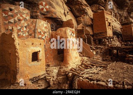 Dogon village and typical mud buildings, buildings used as barns for ...