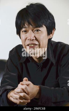 FILE: Japanese screenwriter Yuji Sakamoto speaks during an interview in ...