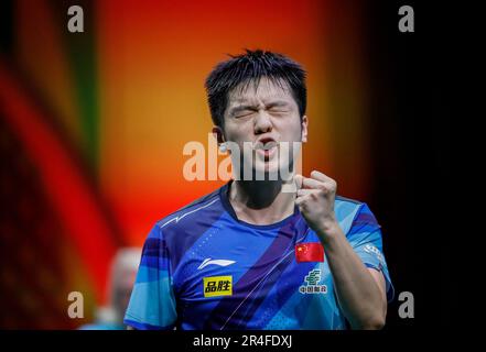 Durban, South Africa. 27th May, 2023. Coach Qiu Yike celebrates scoring ...