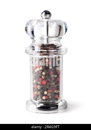 Colored Peppers Mix and pepper grinder on white background Stock Photo ...