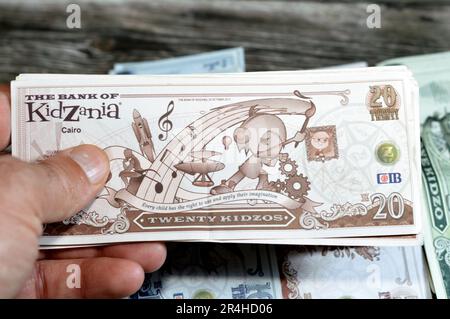 Cairo, Egypt, May 26 2023: KidZos money, currency of KidZania, a ...