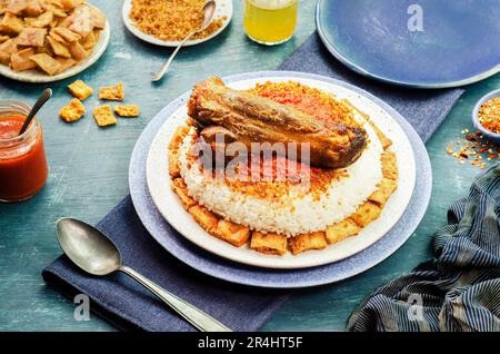 Arabic Cuisine; Egyptian oriental Fattah with white rice and crispy ...