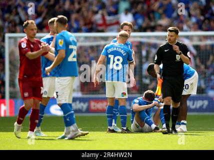 Stockport County players dejected following the Sky Bet League Two play ...