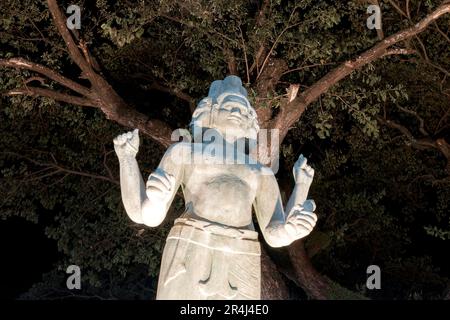 Multi-Faced Deity: The sculpture in Cambodia depicts a captivating ...