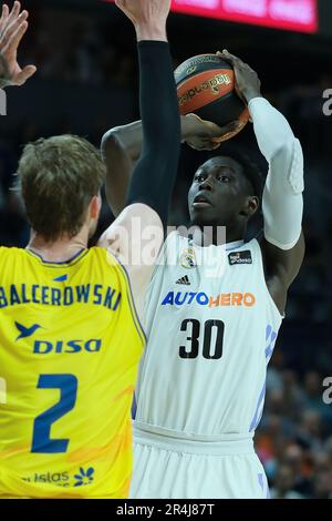 Eli John Ndiaye of Real Madrid and Agustin Ubal of Coviran Granada in action during the Spanish ...