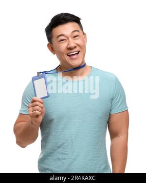 Happy asian man with vip pass badge showing thumbs up on white ...