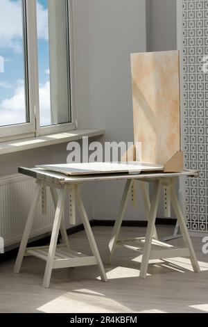 Double-sided backdrop on table in photo studio Stock Photo - Alamy
