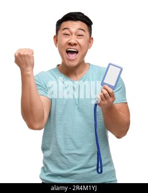 Emotional asian man with vip pass badge on purple background. Space for ...