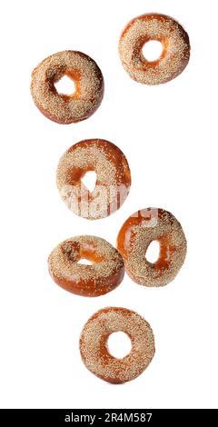 Sesame seeds falling on white background, collage Stock Photo - Alamy