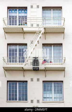 House facade with balconies and fire escape, Chinatown, San Francisco ...