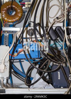 Electrical and fiber optic Internet wires are laid along the metal ...